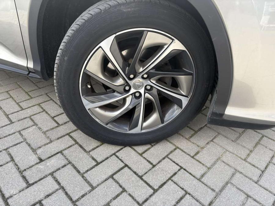 Brown Lexus RX 450h 2017 in Taurage, with an engine capacity of 3.46 L and mileage of 230 thousand km for 26500 €, photo 39 on AUTOMOTO.COM.LV
