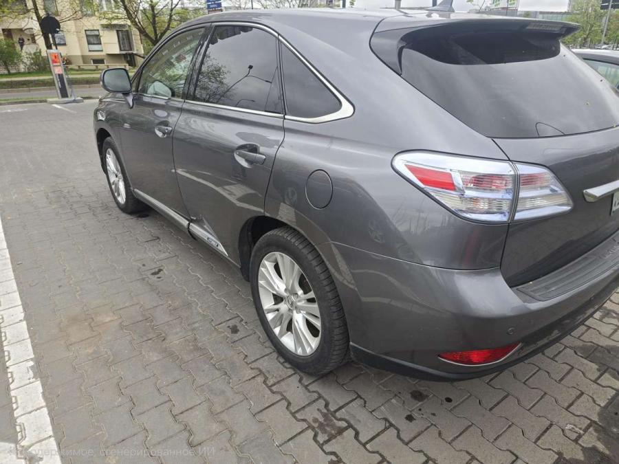 Grey Lexus RX 450h 2013 in Vilnius, with an engine capacity of 3.46 L and mileage of 180 thousand km for 12999 €, photo 4 on AUTOMOTO.COM.LV