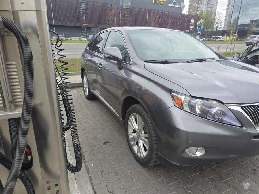 Grey Lexus RX 450h 2013 in Vilnius, with an engine capacity of 3.46 L and mileage of 180 thousand km for 12999 €, photo 6 on AUTOMOTO.COM.LV