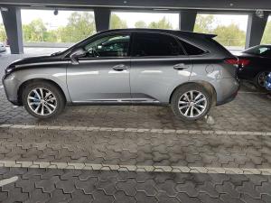 Grey Lexus RX 450h 2013 in Vilnius, with an engine capacity of 3.46 L and mileage of 185 thousand km for 17800 €, photo 1 on AUTOMOTO.COM.LV