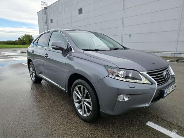 Grey Lexus RX 450h 2015 in Panevezys, with an engine capacity of 3.46 L and mileage of 284 thousand km for 14900 €, photo 1 on AUTOMOTO.COM.LV