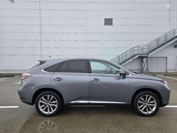 Grey Lexus RX 450h 2015 in Panevezys, with an engine capacity of 3.46 L and mileage of 284 thousand km for 14900 €, photo 3 on AUTOMOTO.COM.LV