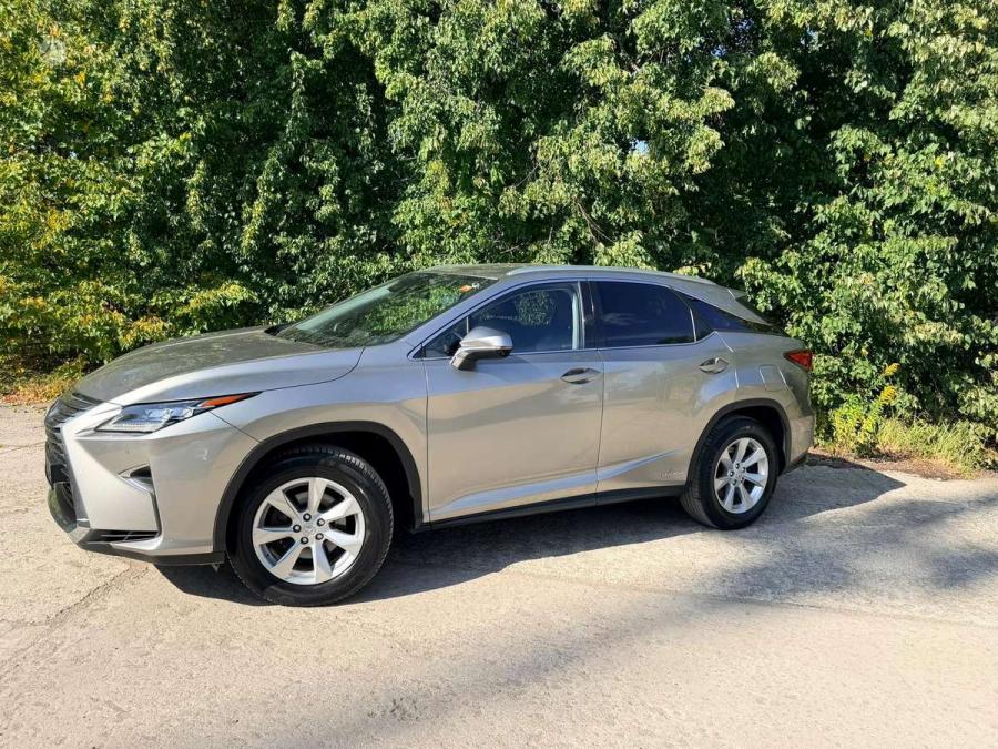 Grey Lexus RX 450h 2016 in Siauliai, with an engine capacity of 3.46 L and mileage of 250 thousand km for 20950 €, photo 5 on AUTOMOTO.COM.LV