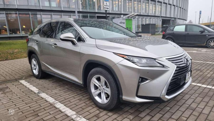 Grey Lexus RX 450h 2017 in Marijampole, with an engine capacity of 3.46 L and mileage of 165 thousand km for 28200 €, photo 2 on AUTOMOTO.COM.LV