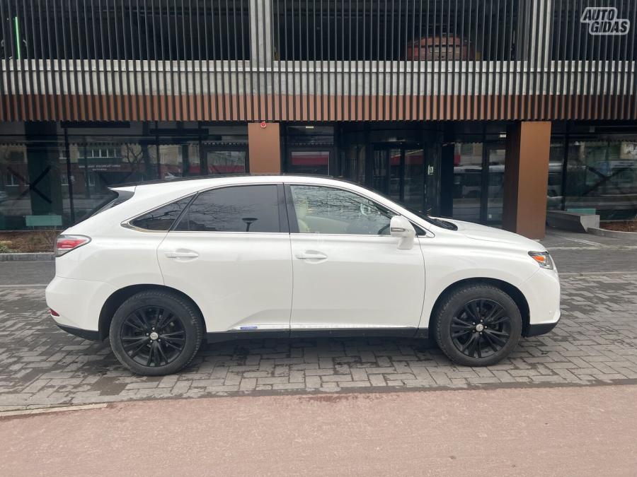 White Lexus RX 450h 2011 in Vilnius, with an engine capacity of 3.50 L and mileage of 244 thousand km for 13900 €, photo 8 on AUTOMOTO.COM.LV