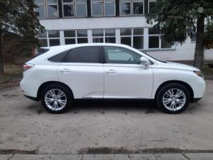 White Lexus RX 450h 2012 in Alytus, with an engine capacity of 3.46 L and mileage of 365 thousand km for 10700 €, photo 4 on AUTOMOTO.COM.LV