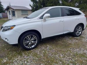 White Lexus RX 450h 2012 in Vilnius, with an engine capacity of 3.50 L and mileage of 274 thousand km for 11450 €, photo 2 on AUTOMOTO.COM.LV