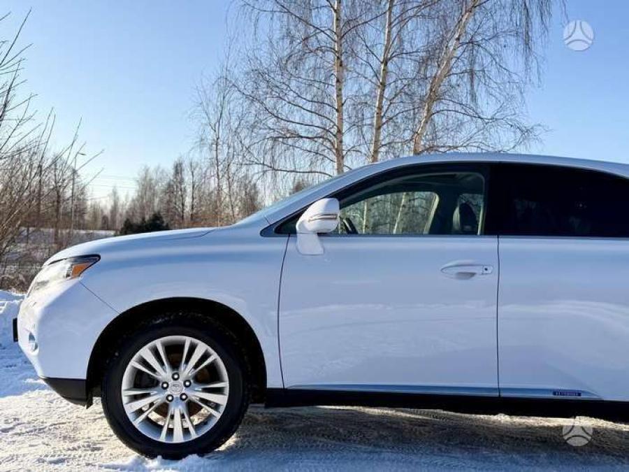 White Lexus RX 450h 2012 in Siauliai, with an engine capacity of 3.46 L and mileage of 289 thousand km for 14199 €, photo 11 on AUTOMOTO.COM.LV