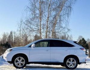 White Lexus RX 450h 2012 in Siauliai, with an engine capacity of 3.46 L and mileage of 289 thousand km for 14199 €, photo 13 on AUTOMOTO.COM.LV