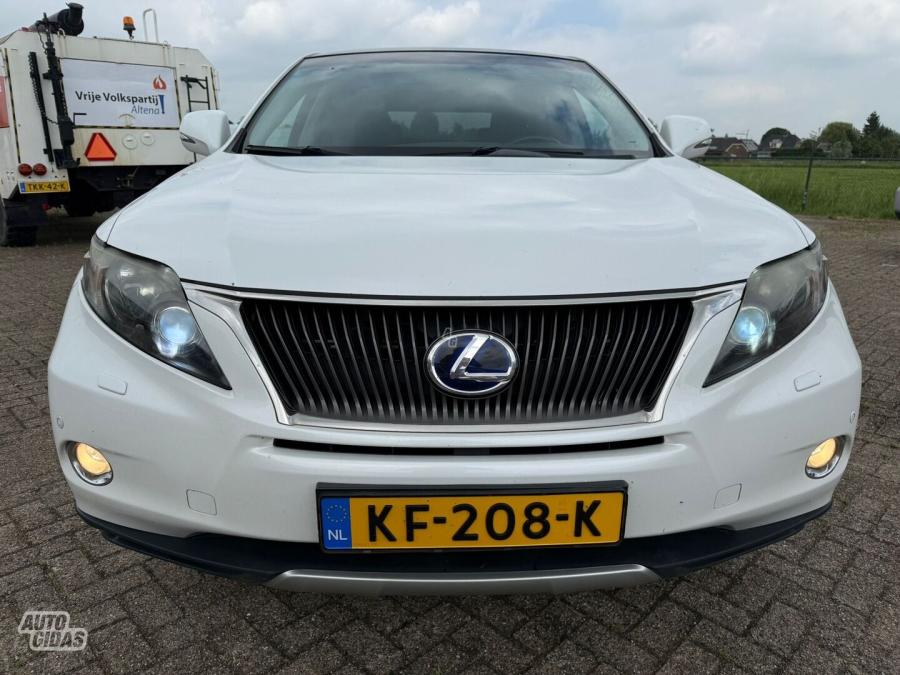 White Lexus RX 450h 2012 in Kaunas, with an engine capacity of 3.50 L and mileage of 269 thousand km for 11650 €, photo 4 on AUTOMOTO.COM.LV