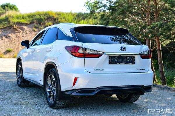 White Lexus RX 450h 2016 in Kretinga, with an engine capacity of 3.50 L and mileage of 256 thousand km for 24950 €, photo 7 on AUTOMOTO.COM.LV