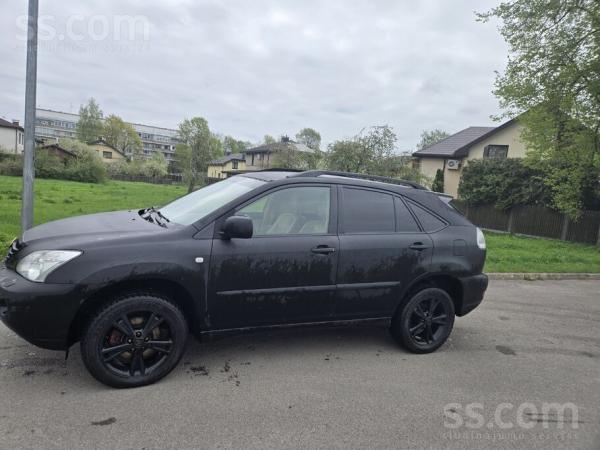 Black Lexus RX 2006 in Riga, with an engine capacity of 3.30 L and mileage of 412 thousand km for 3250 €, photo 4 on AUTOMOTO.COM.LV