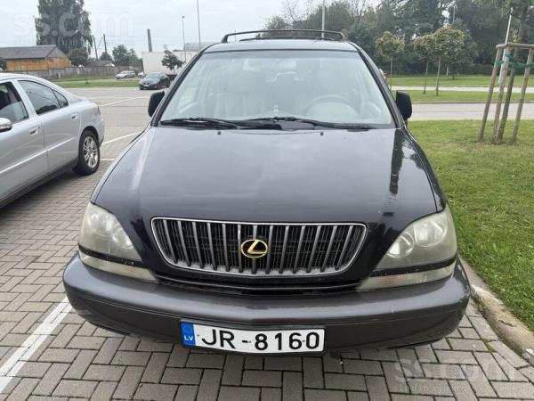 Black Lexus RX 1999 in Riga, with an engine capacity of 3.00 L and mileage of 212 thousand km for 990 €, photo 3 on AUTOMOTO.COM.LV