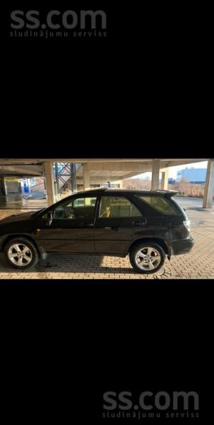 Black Lexus RX 2002 in Riga, with an engine capacity of 3.00 L and mileage of 322 thousand km for 2700 €, photo 6 on AUTOMOTO.COM.LV