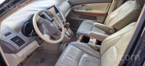 Black Lexus RX 2004 in Riga, with an engine capacity of 3.30 L and mileage of 168 thousand km for 1600 €, photo 3 on AUTOMOTO.COM.LV
