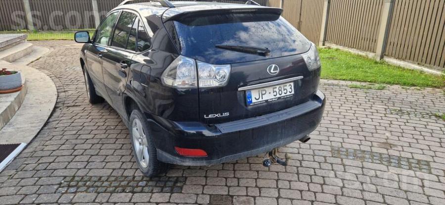 Black Lexus RX 2004 in Riga, with an engine capacity of 3.30 L and mileage of 168 thousand km for 1600 €, photo 4 on AUTOMOTO.COM.LV