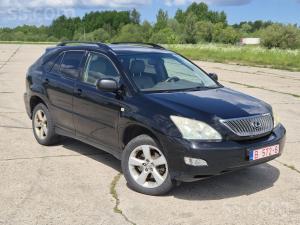 Black Lexus RX 2006 in Riga, with an engine capacity of 3.50 L and mileage of 206 thousand km for 7800 €, photo 2 on AUTOMOTO.COM.LV