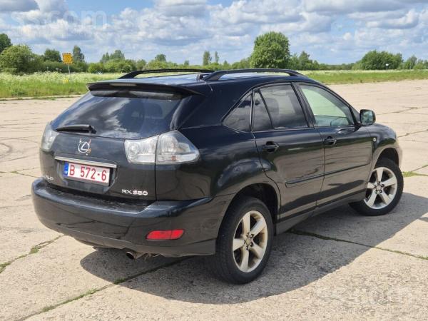 Black Lexus RX 2006 in Riga, with an engine capacity of 3.50 L and mileage of 206 thousand km for 7800 €, photo 3 on AUTOMOTO.COM.LV