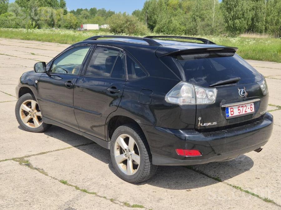 Black Lexus RX 2006 in Riga, with an engine capacity of 3.50 L and mileage of 206 thousand km for 7800 €, photo 4 on AUTOMOTO.COM.LV