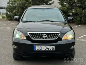 Black Lexus RX 2007 in Riga, with an engine capacity of 3.50 L and mileage of 174 thousand km for 7300 €, photo 26 on AUTOMOTO.COM.LV
