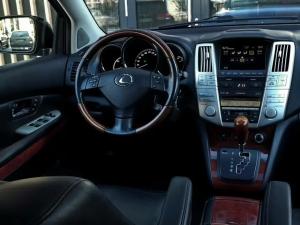 Black Lexus RX 2007 in Riga, with an engine capacity of 3.30 L and mileage of 148 thousand km for 8990 €, photo 8 on AUTOMOTO.COM.LV