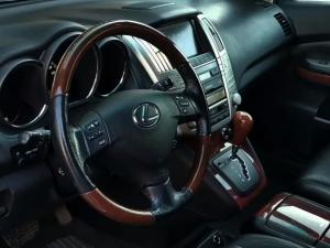 Black Lexus RX 2007 in Riga, with an engine capacity of 3.30 L and mileage of 148 thousand km for 8990 €, photo 9 on AUTOMOTO.COM.LV
