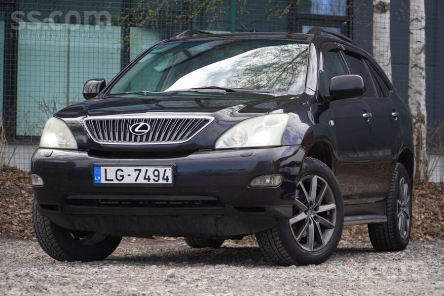 Black Lexus RX 2009 in Riga, with an engine capacity of 3.50 L and mileage of 258 thousand km for 5990 €, photo 4 on AUTOMOTO.COM.LV