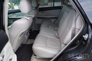 Black Lexus RX 2009 in Riga, with an engine capacity of 3.50 L and mileage of 258 thousand km for 5990 €, photo 16 on AUTOMOTO.COM.LV