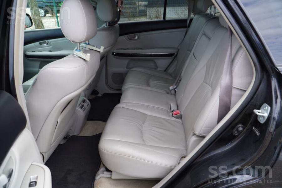 Black Lexus RX 2009 in Riga, with an engine capacity of 3.50 L and mileage of 258 thousand km for 5990 €, photo 16 on AUTOMOTO.COM.LV