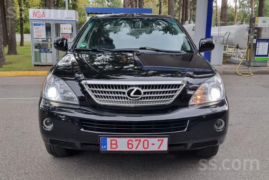 Black Lexus RX 2009 in Riga, with an engine capacity of 3.30 L and mileage of 262 thousand km for 7950 €, photo 4 on AUTOMOTO.COM.LV