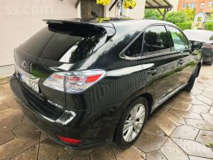 Black Lexus RX 2010 in Riga, with an engine capacity of 3.50 L and mileage of 270 thousand km for 6900 €, photo 4 on AUTOMOTO.COM.LV