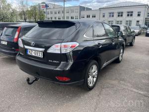 Black Lexus RX 2011 in Riga, with an engine capacity of 3.50 L and mileage of 269 thousand km for 10900 €, photo 3 on AUTOMOTO.COM.LV