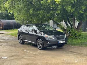 Black Lexus RX 2011 in Riga, with an engine capacity of 3.50 L and mileage of 304 thousand km for 11700 €, photo 7 on AUTOMOTO.COM.LV