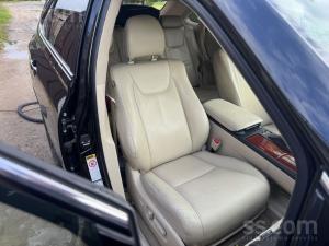Black Lexus RX 2011 in Riga, with an engine capacity of 3.50 L and mileage of 304 thousand km for 11700 €, photo 12 on AUTOMOTO.COM.LV