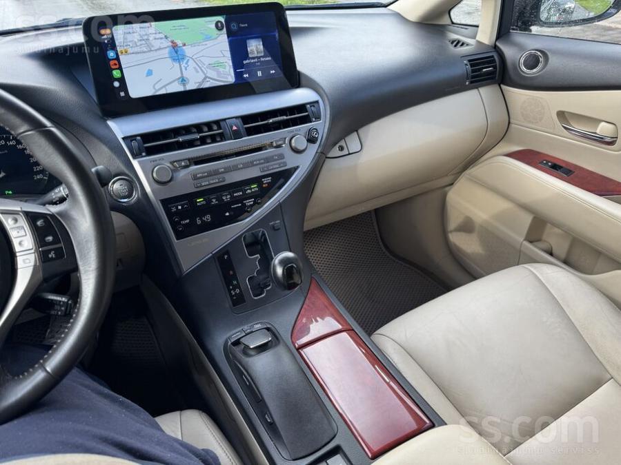 Black Lexus RX 2011 in Riga, with an engine capacity of 3.50 L and mileage of 304 thousand km for 11700 €, photo 27 on AUTOMOTO.COM.LV
