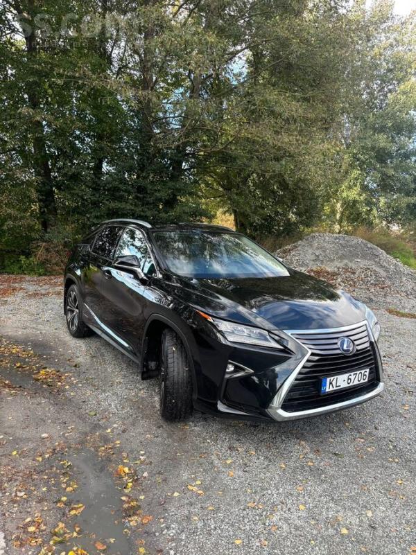 Black Lexus RX 2016 in Riga, with an engine capacity of 3.50 L and mileage of 195 thousand km for 28000 €, photo 3 on AUTOMOTO.COM.LV