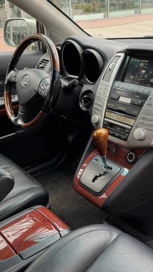Blue Lexus RX 2007 in Riga, with an engine capacity of 3.30 L and mileage of 381 thousand km for 3900 €, photo 30 on AUTOMOTO.COM.LV