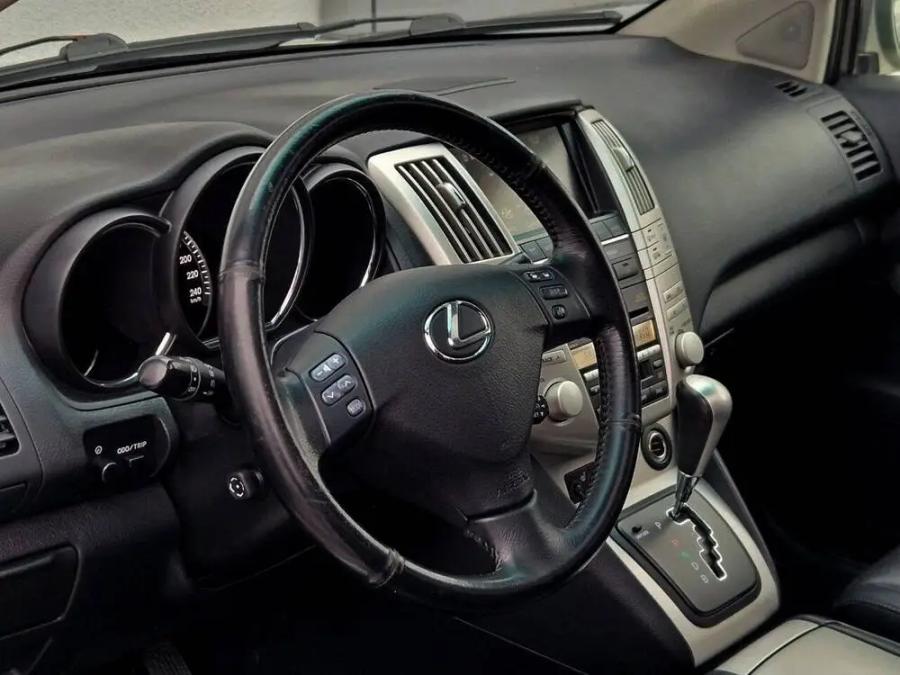 Blue Lexus RX 2008 in Riga, with an engine capacity of 3.30 L and mileage of 309 thousand km for 6190 €, photo 31 on AUTOMOTO.COM.LV