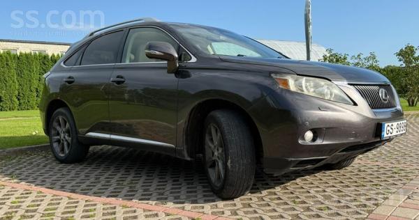 Brown Lexus RX 2009 in Riga, with an engine capacity of 3.50 L and mileage of 265 thousand km for 8100 €, photo 1 on AUTOMOTO.COM.LV