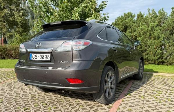 Brown Lexus RX 2009 in Riga, with an engine capacity of 3.50 L and mileage of 265 thousand km for 8100 €, photo 6 on AUTOMOTO.COM.LV
