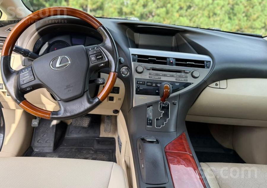 Brown Lexus RX 2009 in Riga, with an engine capacity of 3.50 L and mileage of 265 thousand km for 8100 €, photo 7 on AUTOMOTO.COM.LV
