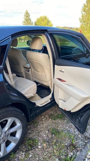 Brown Lexus RX 2009 in Riga, with an engine capacity of 3.50 L and mileage of 194 thousand km for 11000 €, photo 13 on AUTOMOTO.COM.LV