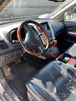 Grey Lexus RX 2007 in Riga, with an engine capacity of 3.50 L and mileage of 258 thousand km for 4200 €, photo 5 on AUTOMOTO.COM.LV