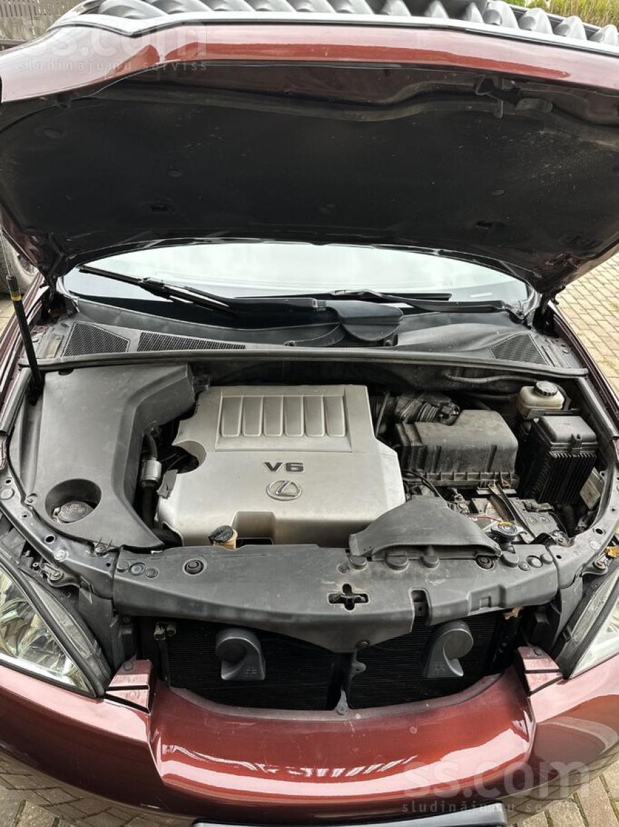 Red Lexus RX 2008 in Riga, with an engine capacity of 3.50 L and mileage of 118 thousand km for 8300 €, photo 5 on AUTOMOTO.COM.LV