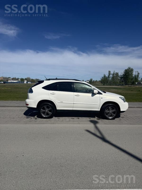 White Lexus RX 2007 in Riga, with an engine capacity of 3.00 L and mileage of 254 thousand km for 3500 €, photo 6 on AUTOMOTO.COM.LV