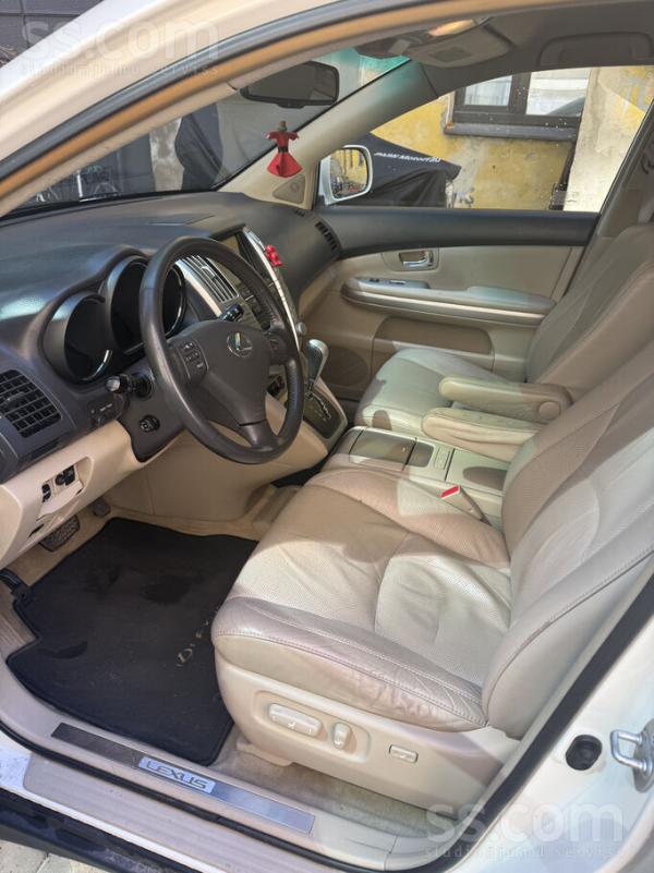 White Lexus RX 2007 in Riga, with an engine capacity of 3.00 L and mileage of 254 thousand km for 3500 €, photo 10 on AUTOMOTO.COM.LV