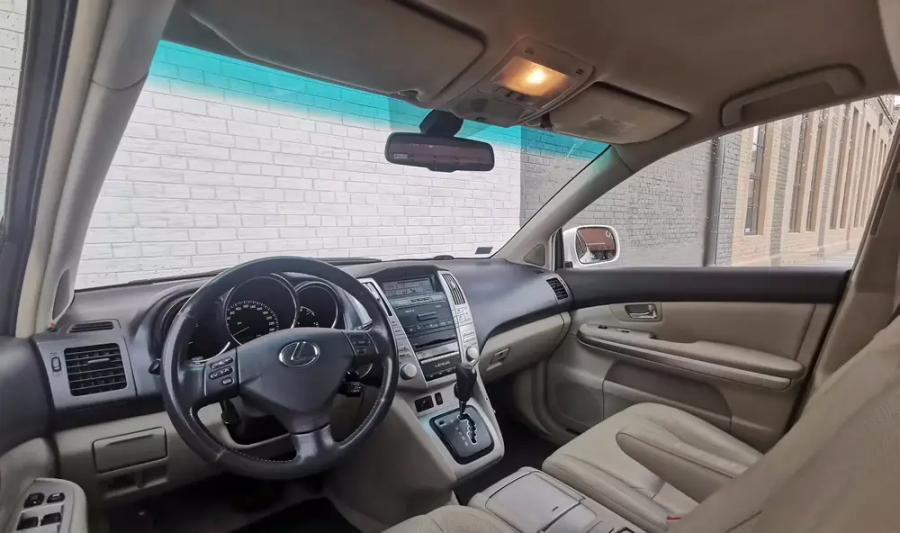 White Lexus RX 2009 in Riga, with an engine capacity of 3.30 L and mileage of 274 thousand km for 5690 €, photo 5 on AUTOMOTO.COM.LV