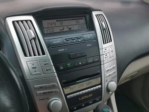 White Lexus RX 2009 in Riga, with an engine capacity of 3.30 L and mileage of 274 thousand km for 5690 €, photo 12 on AUTOMOTO.COM.LV
