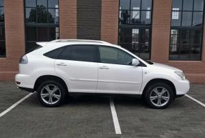 White Lexus RX 2009 in Riga, with an engine capacity of 3.30 L and mileage of 274 thousand km for 5690 €, photo 21 on AUTOMOTO.COM.LV
