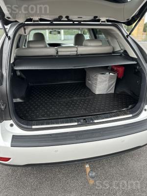 White Lexus RX 2011 in Riga, with an engine capacity of 3.50 L and mileage of 248 thousand km for 14900 €, photo 7 on AUTOMOTO.COM.LV